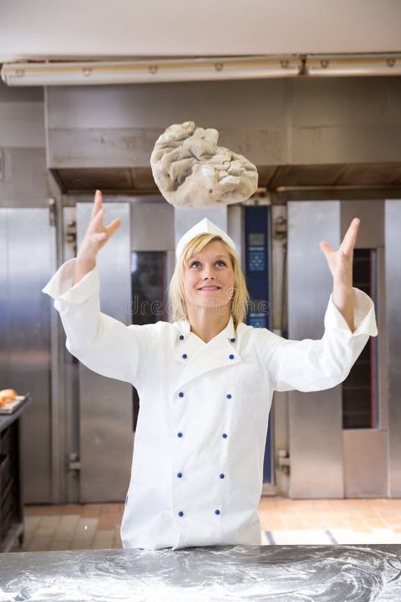 Baker Throwing Bread Dough in Bakery or Bakehouse Stock Image - Image ...