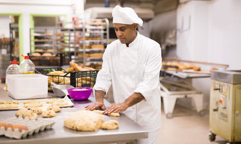 Baker at Work - Making Sweet Buns with Dough Stock Image - Image of ...
