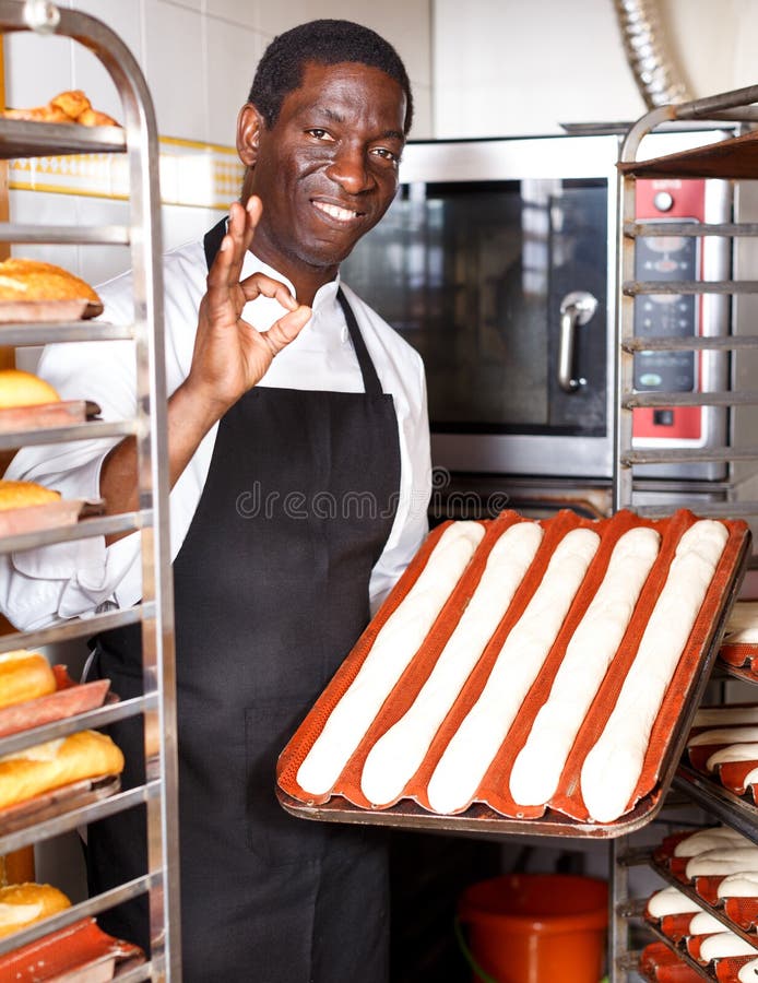 Baker Workin in Kitchen of Bakeshop Stock Photo - Image of bread ...