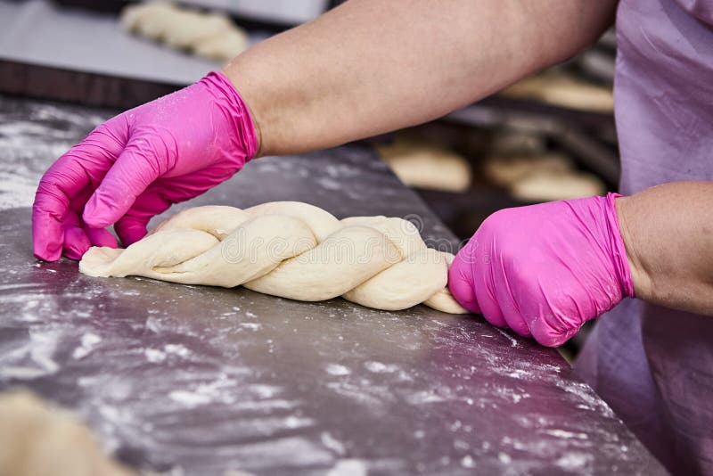 Bakers Hands Form Dough for Baking Bread and Put it into Oven-tray at ...