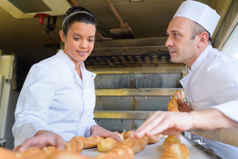 Bakers making bread stock image. Image of horizontal - 259240911