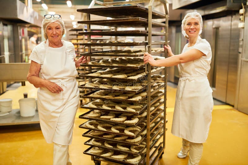 Bakers Push Shelf Carts with Croissants for Baking Stock Image - Image ...