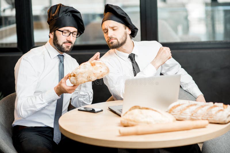 Bakers Working with Bread in the Office Stock Photo - Image of checking ...