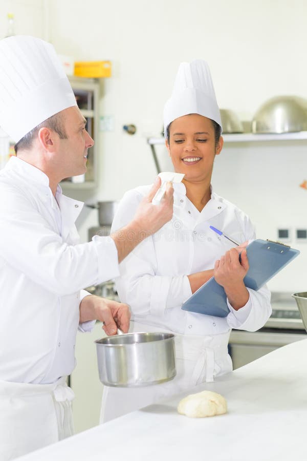 Bakers Working with Dough in Bakery Kitchen Stock Image - Image of ...