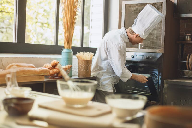 Bakery Chef Cooking Bake in the Kitchen Professional Stock Image ...