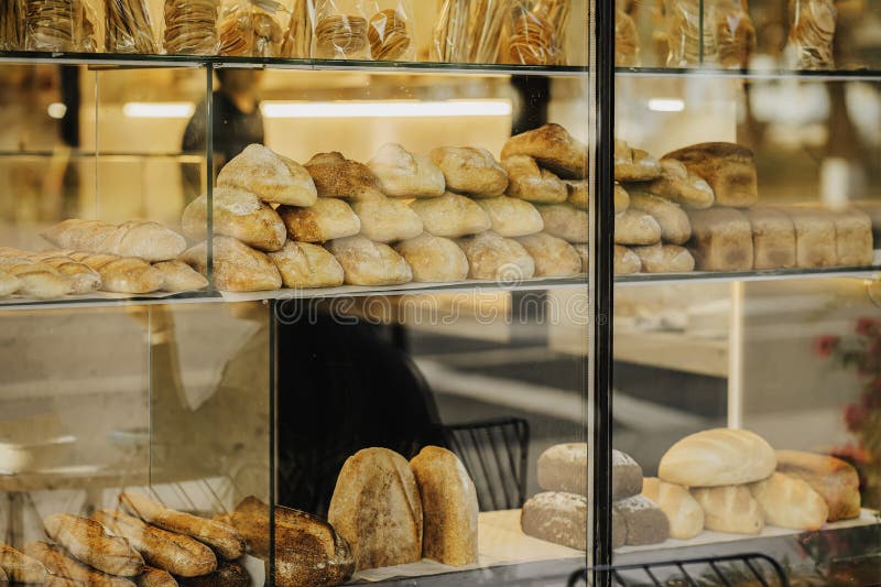 Bakery Display Case with Variety of Breads and Pastries. Blurred View ...