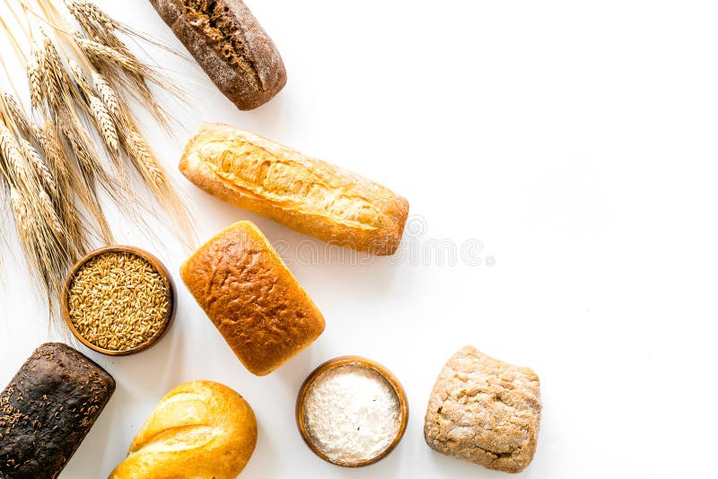 Bakery. Fresh Bread in Assortment on White Table Top-down Copy Space ...