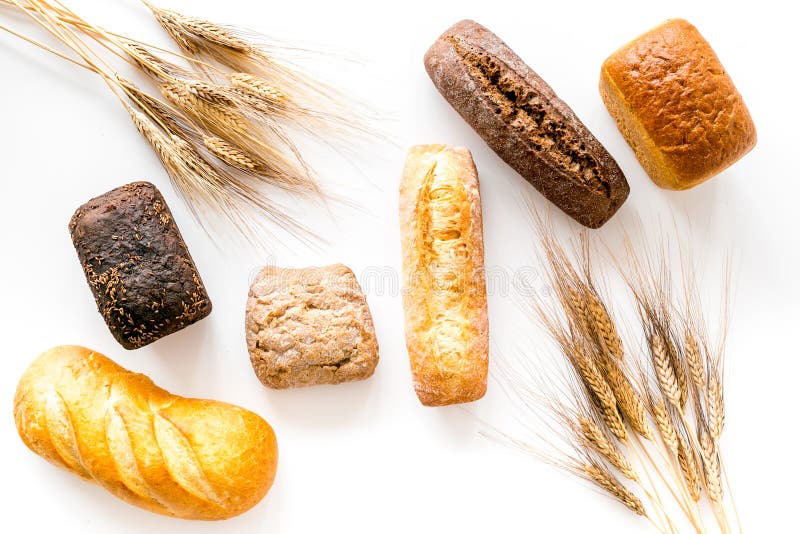 Bakery. Fresh Bread in Assortment on White Table Top-down Stock Photo ...