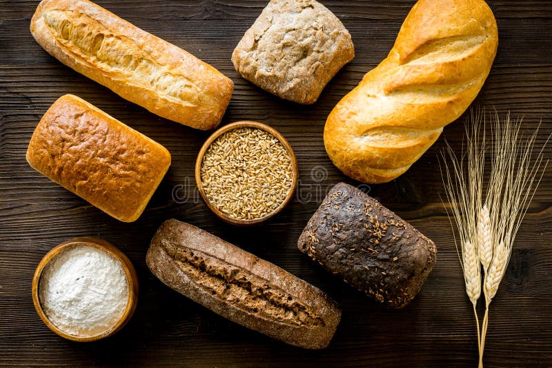 Bakery. Fresh Bread in Assortment on Wooden Table Top-down Stock Image ...
