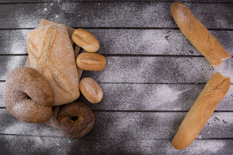 Bakery - Gold Rustic Crusty Loaves of Bread and Buns on Black ...