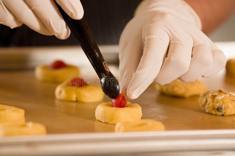 Bakery Man Preparing Delicious Christmas Cookies in a Bakery Store ...