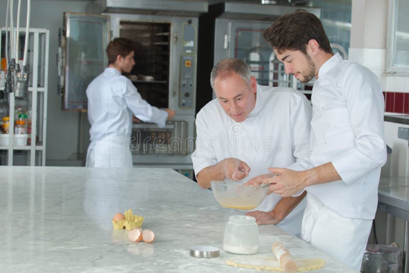 Bakery Teacher with Students in School Kitchen Stock Photo - Image of ...