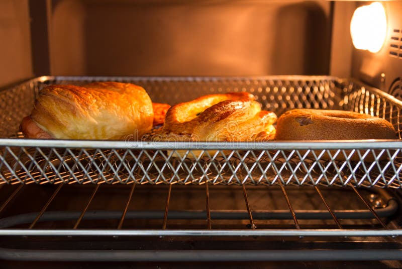 Bakery on tray in oven stock photo. Image of cooker, donut - 29905262