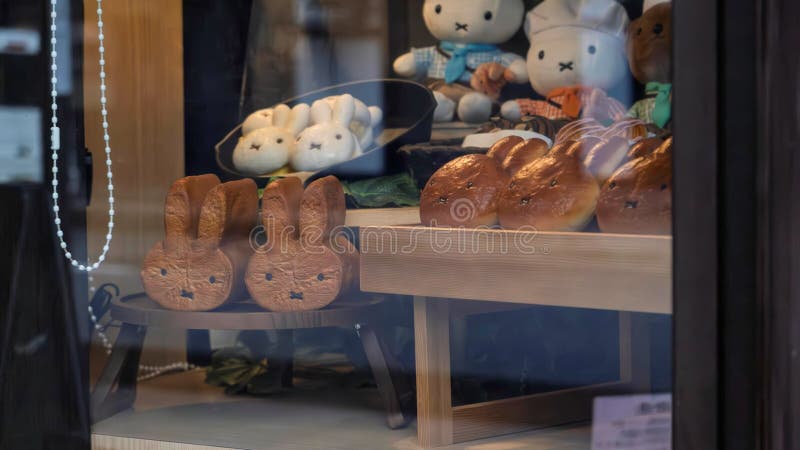 Charming Bakery Window with Rabbit Bread and Toys. Stock Photo - Image ...