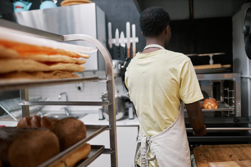 Bakery Worker Making Bread stock image. Image of crust - 268108033