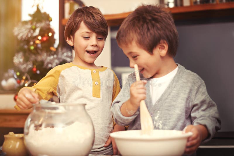 Baking Brothers. Two Young Brothers Baking in the Kitchen. Stock Image ...