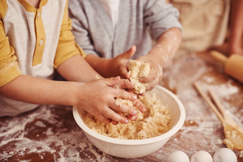 Baking Brothers. Two Young Brothers Baking in the Kitchen. Stock Image ...