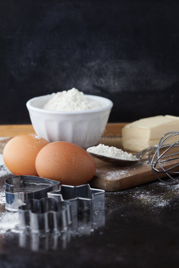 Baking Cake Ingredients on Black from Above Stock Photo - Image of cake ...
