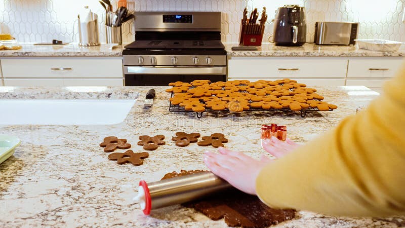 Baking Christmas Gingerbread Cookies in a Modern Kitchen Stock Photo ...