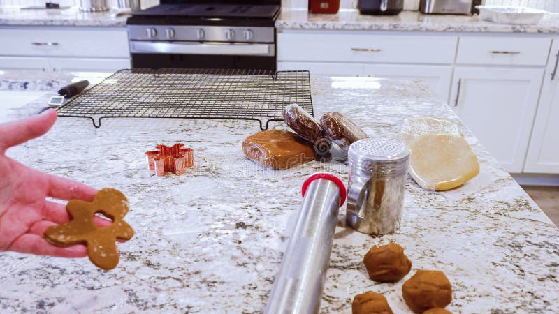 Baking Christmas Gingerbread Cookies in a Modern Kitchen Stock Photo ...