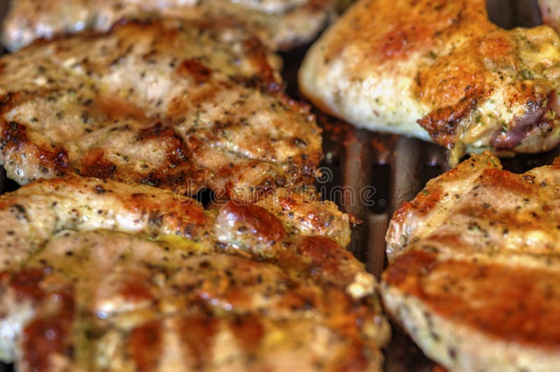 Baking fresh meat on grill stock image. Image of cooking - 92537499