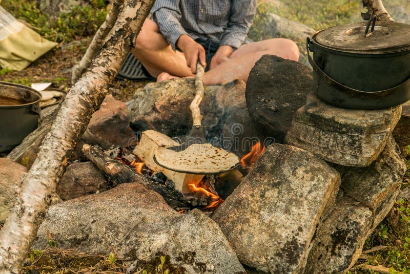 Baking Frying Bread on an Open Fire Outside Stock Photo - Image of ...