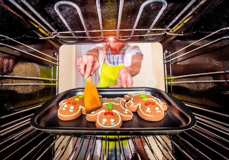 Baking Gingerbread Man in the Oven Stock Photo - Image of bakery ...