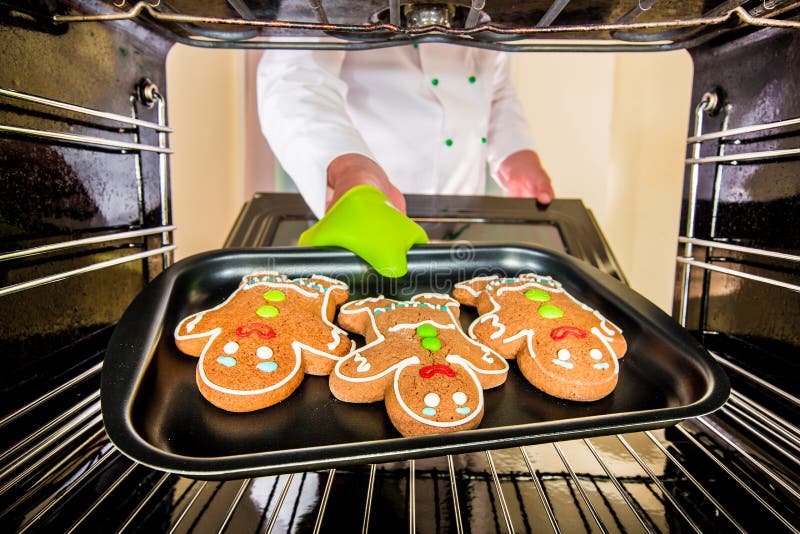 Baking Gingerbread Man in the Oven Stock Image - Image of food, home ...