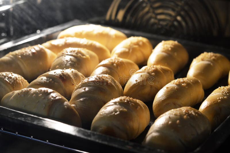 Baking homemade rolls stock image. Image of food, rolls - 128954437