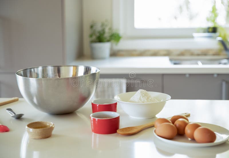 Baking Ingredients on White Kitchen Table, Baking at Home, Cake in a ...