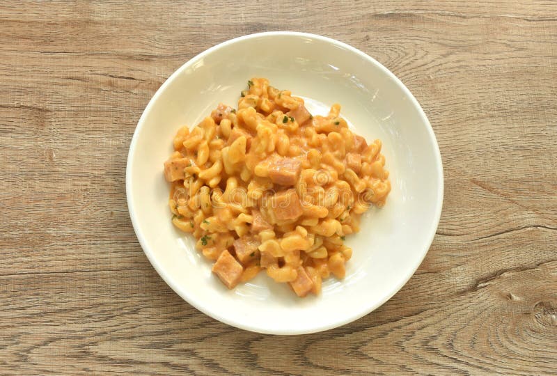 Baking Macaroni and Slice Ham Pork Sausage with Cheese on Plate Stock ...