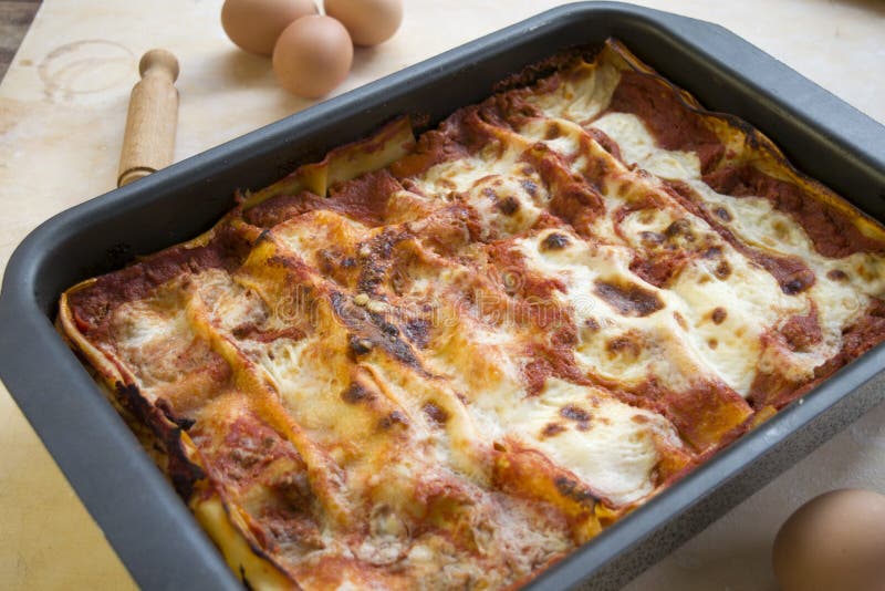 Baking pan of lasagna stock image. Image of tomato, stuffed - 76944243