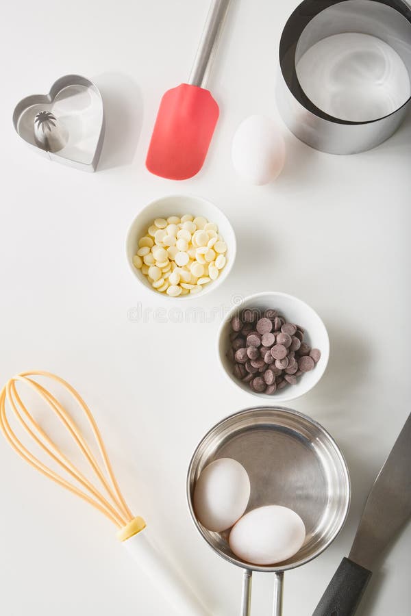 Baking Preparation with Ingredients and Tools Arranged on a White ...