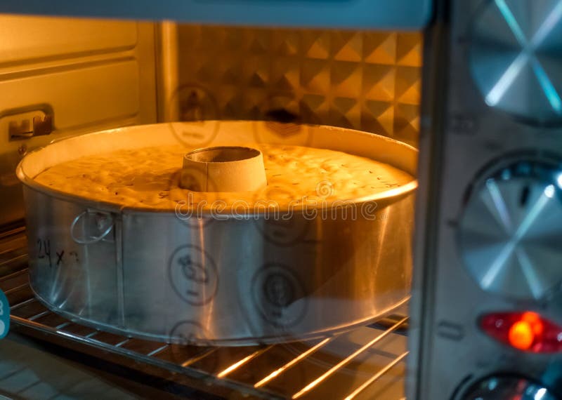 Baking Process of Making Homemade Sponge Cake in the Oven Stock Photo ...
