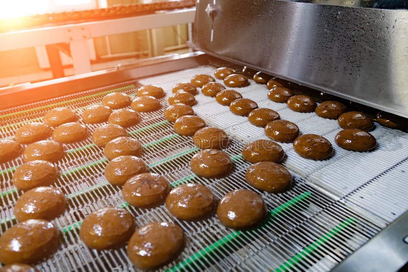 Baking Production Line. Cookies after Glaze Coating Stock Image - Image ...