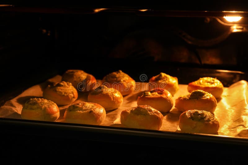 Baking Puff Pastry with Tasty Filling in Oven Stock Photo - Image of ...