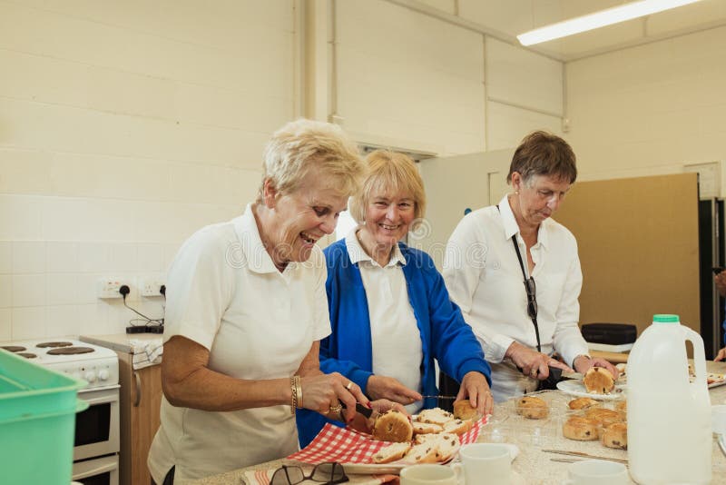 Baking with Senior Women stock image. Image of laughing - 157006975