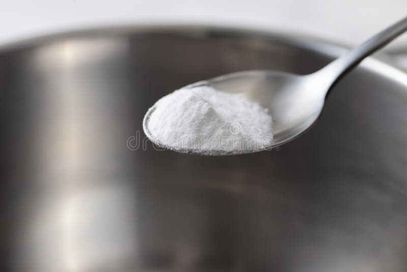 Baking Soda in a Spoon Over a Metal Dish Stock Photo - Image of cooking ...