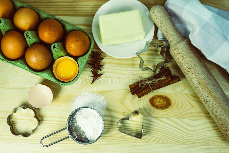 Baking Tools and Kitchen Equipment are Laid Out on a Table Sprinkled ...