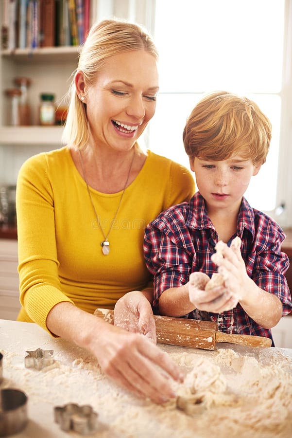 Baking Using Moms Secret Recipe. a Mother and Son Baking Together at ...
