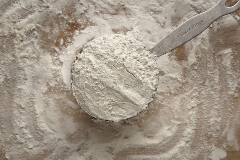 Baking Utensil with Flour on a Flour-covered Table Surface Stock Photo ...