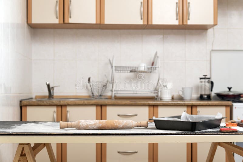 Baking Utensils and Rolling Pin on Table in Modern Kitchen. Chefs ...