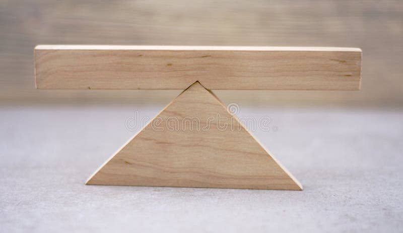 Balance Concept on Wooden Scales on a Light Wooden Background Stock ...