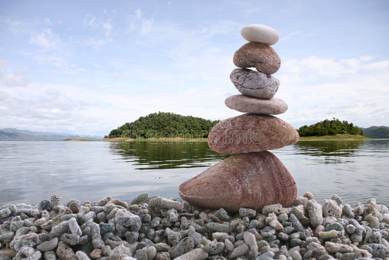 Balance Stone On Pile Rock With River Background. Stock Image - Image ...