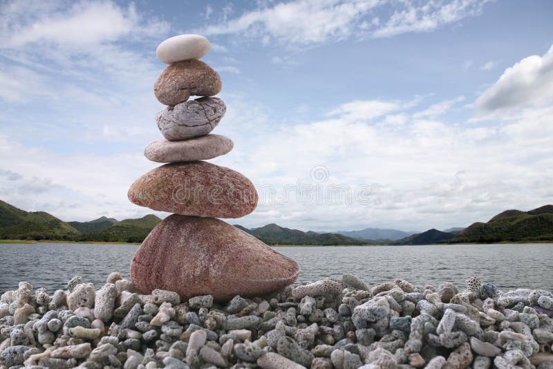 Balance Stone on Pile Rock with River Background. Stock Photo - Image ...