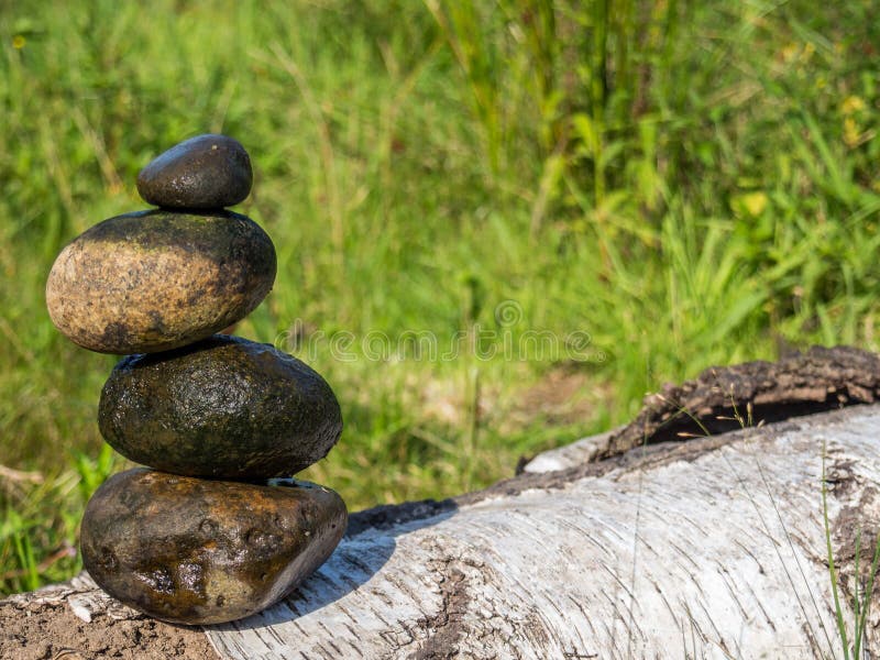Balance stones in a meadow stock image. Image of gravel - 265062573