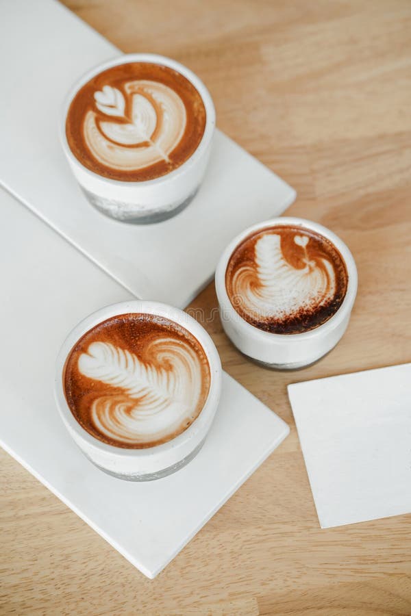 Balanced Latte Art Display stock image. Image of brown - 329098449