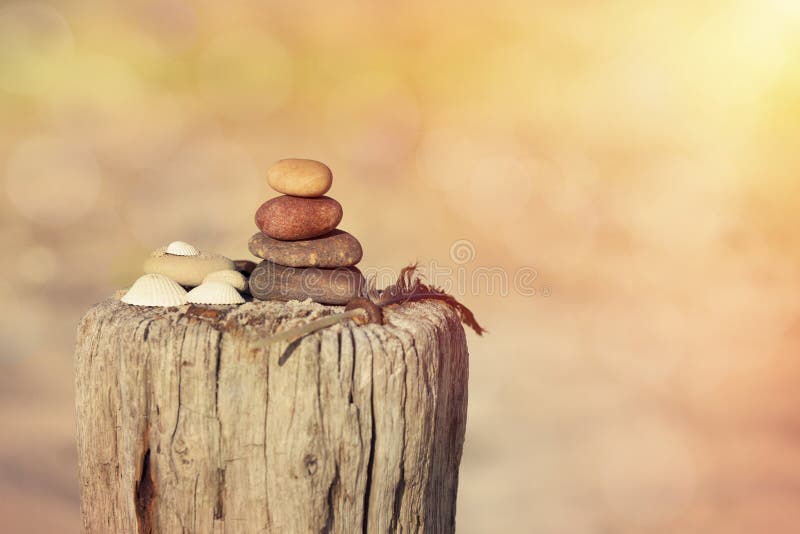 Balanced Pebble Stack on Beach Stock Image - Image of background, dusk ...