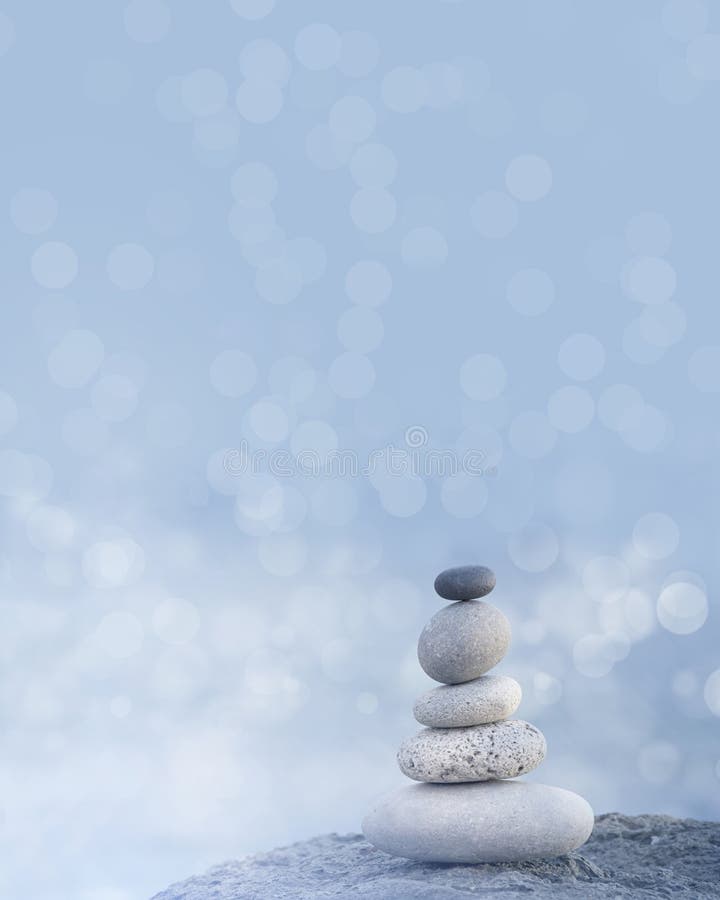 Balanced Pebble Stack in Blue Light Stock Image - Image of pastel ...