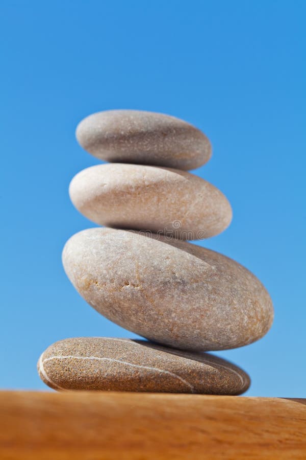 Balanced Pebble Stack on Plain Wood Stock Image - Image of zenlike ...